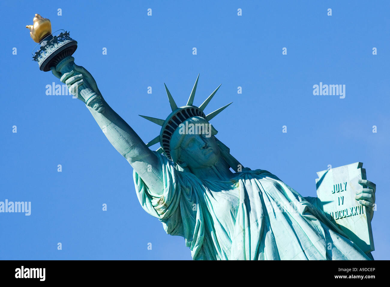Statue of Liberty in sun sunshine and blue sky New York City United ...