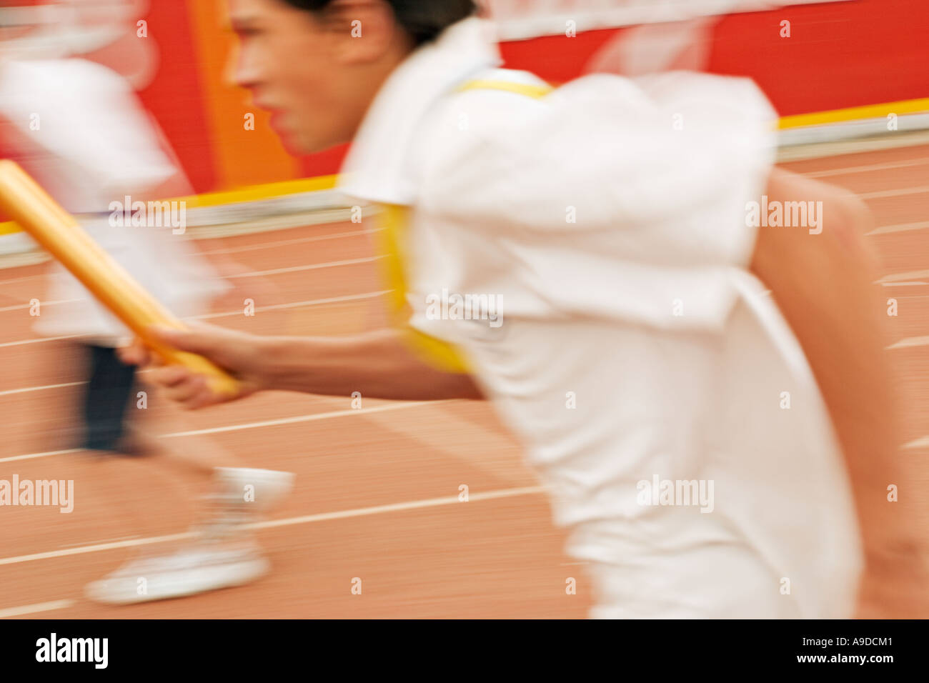 Relay race baton hi-res stock photography and images - Alamy