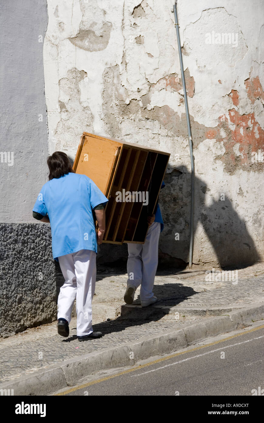 Carrying heavy furniture High Resolution Stock Photography and Images ...