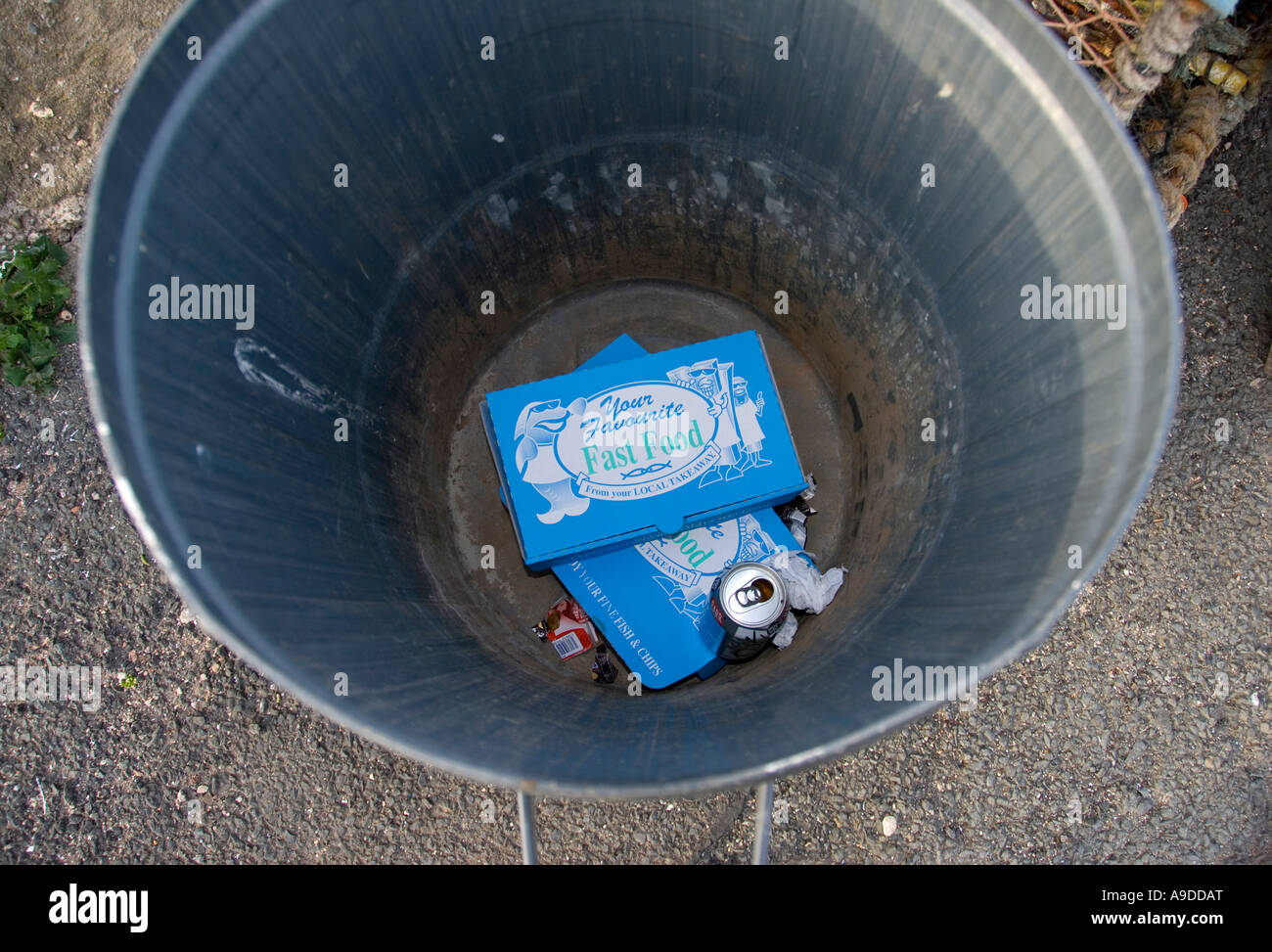rubbish bin with fast food box inside Stock Photo - Alamy