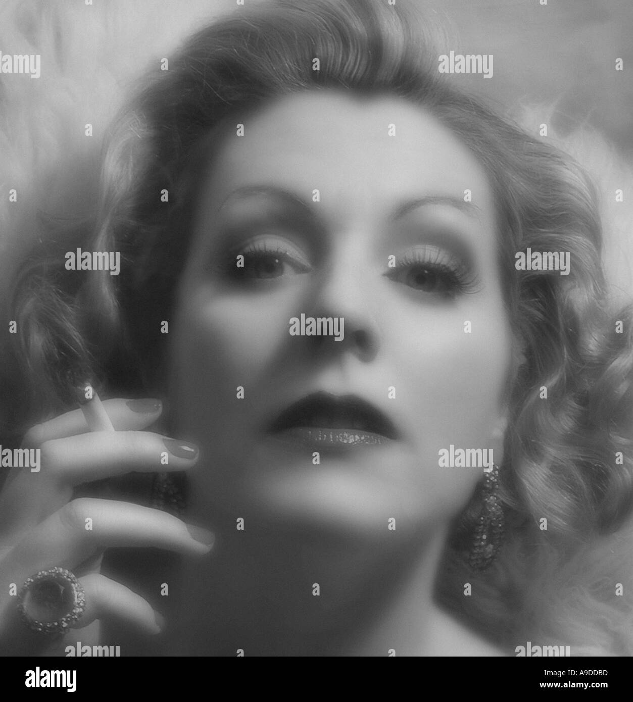 Woman smoking cigarette 1950 hi-res stock photography and images - Alamy