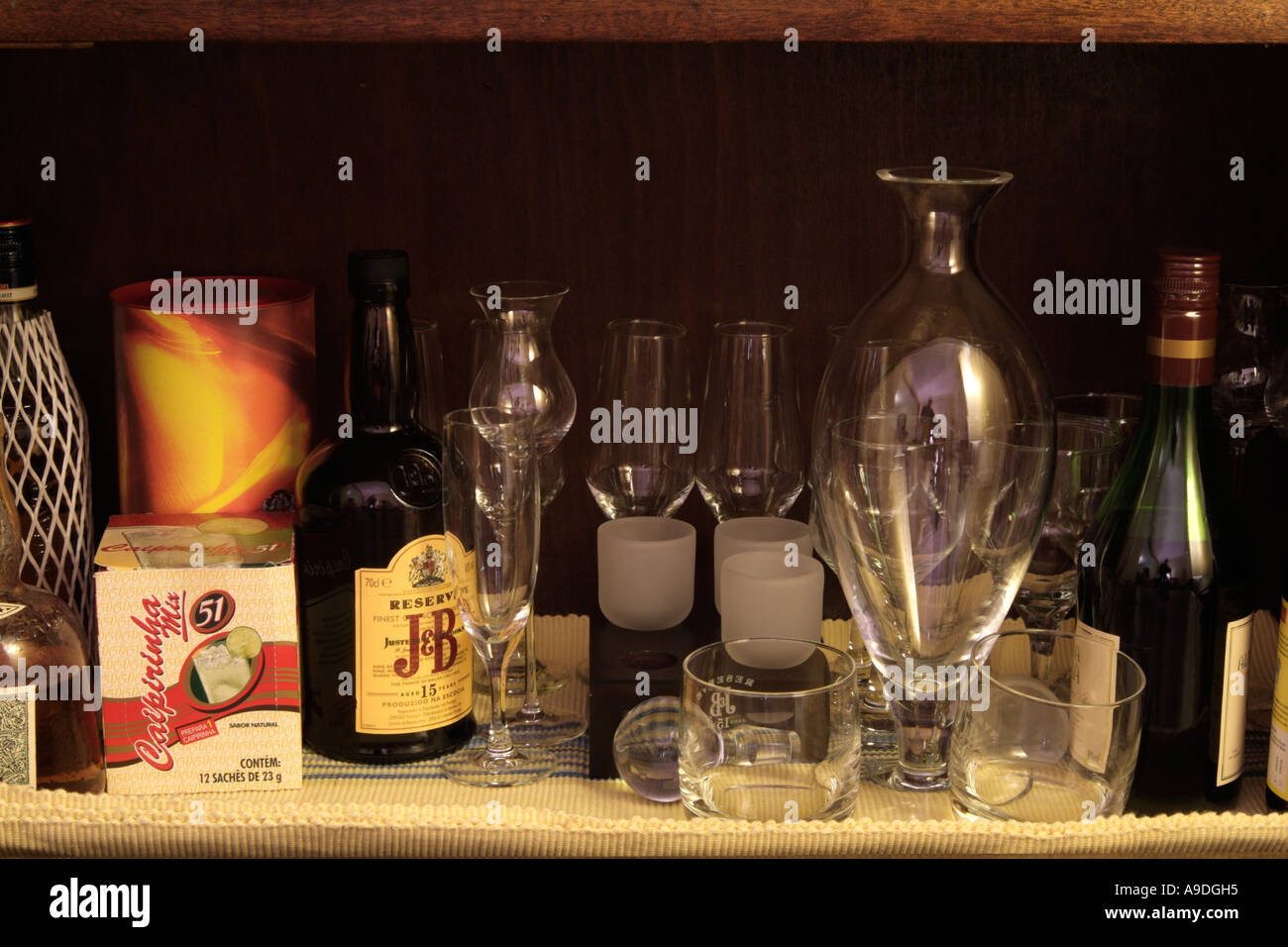 Still life of bottles of alcohol inside a drawer Stock Photo - Alamy