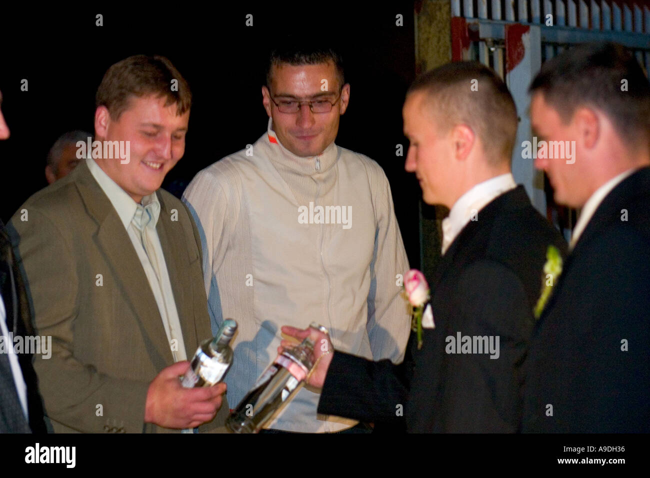 Ritual of wedding party bribing guests with vodka so they can leave ...