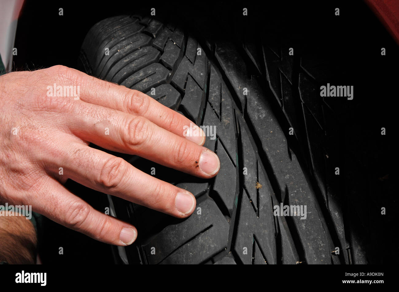Checking tyres hi-res stock photography and images - Alamy