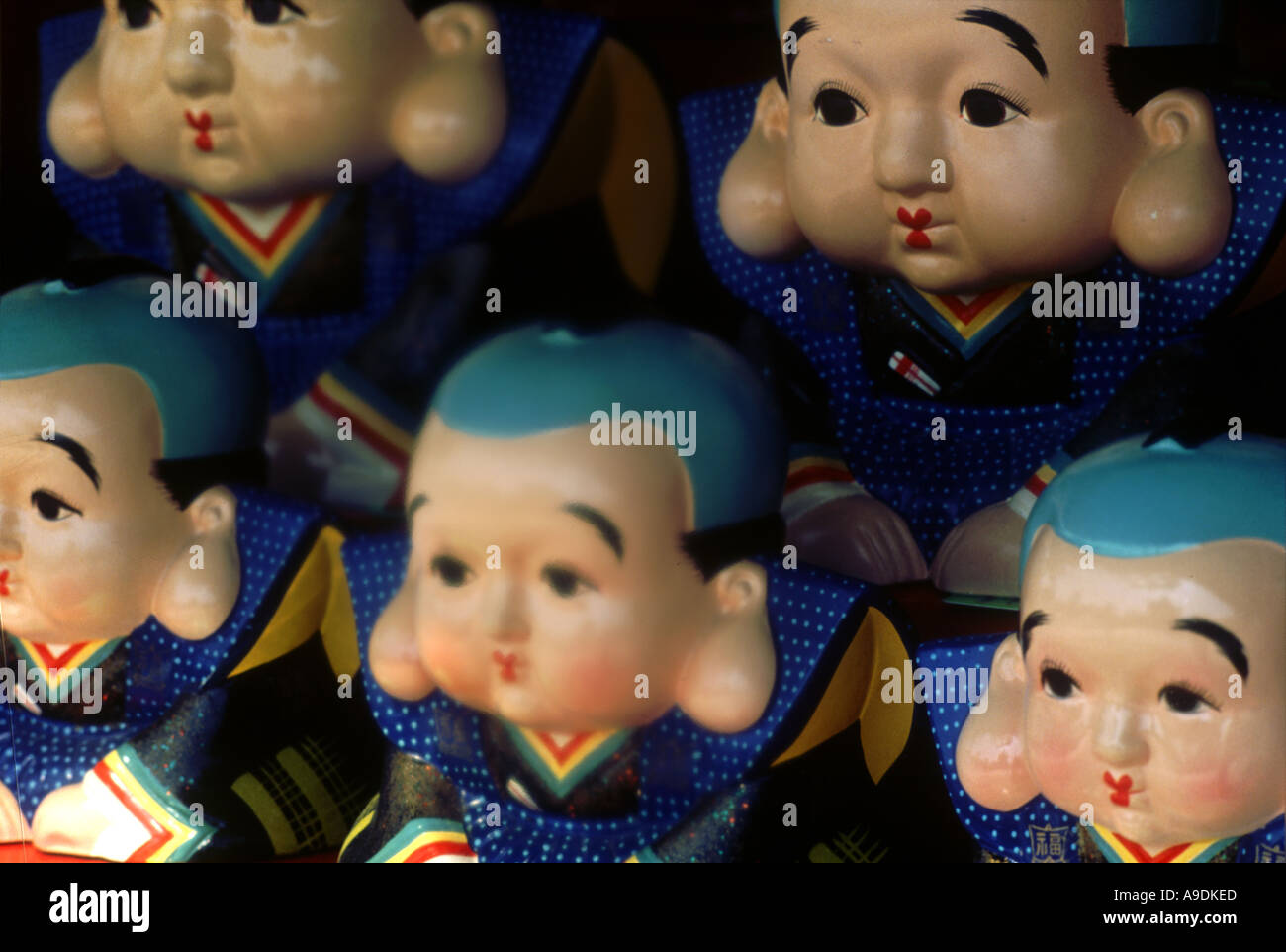 Fukusuke dolls Lucky mascots Japan Stock Photo - Alamy