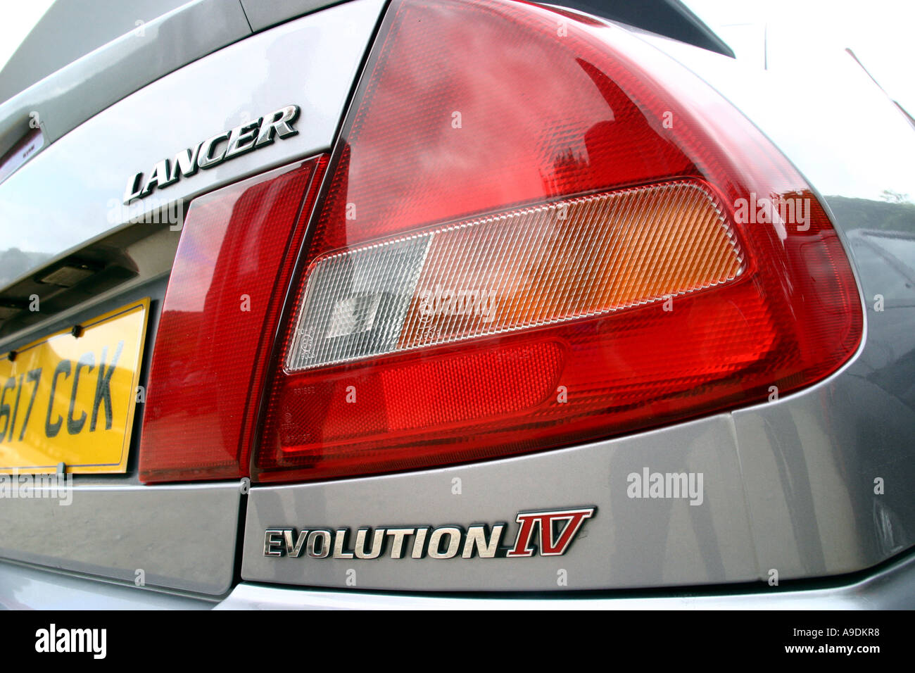 Rear light cluster of Mitsubish Lancer Evolution IV Stock Photo - Alamy