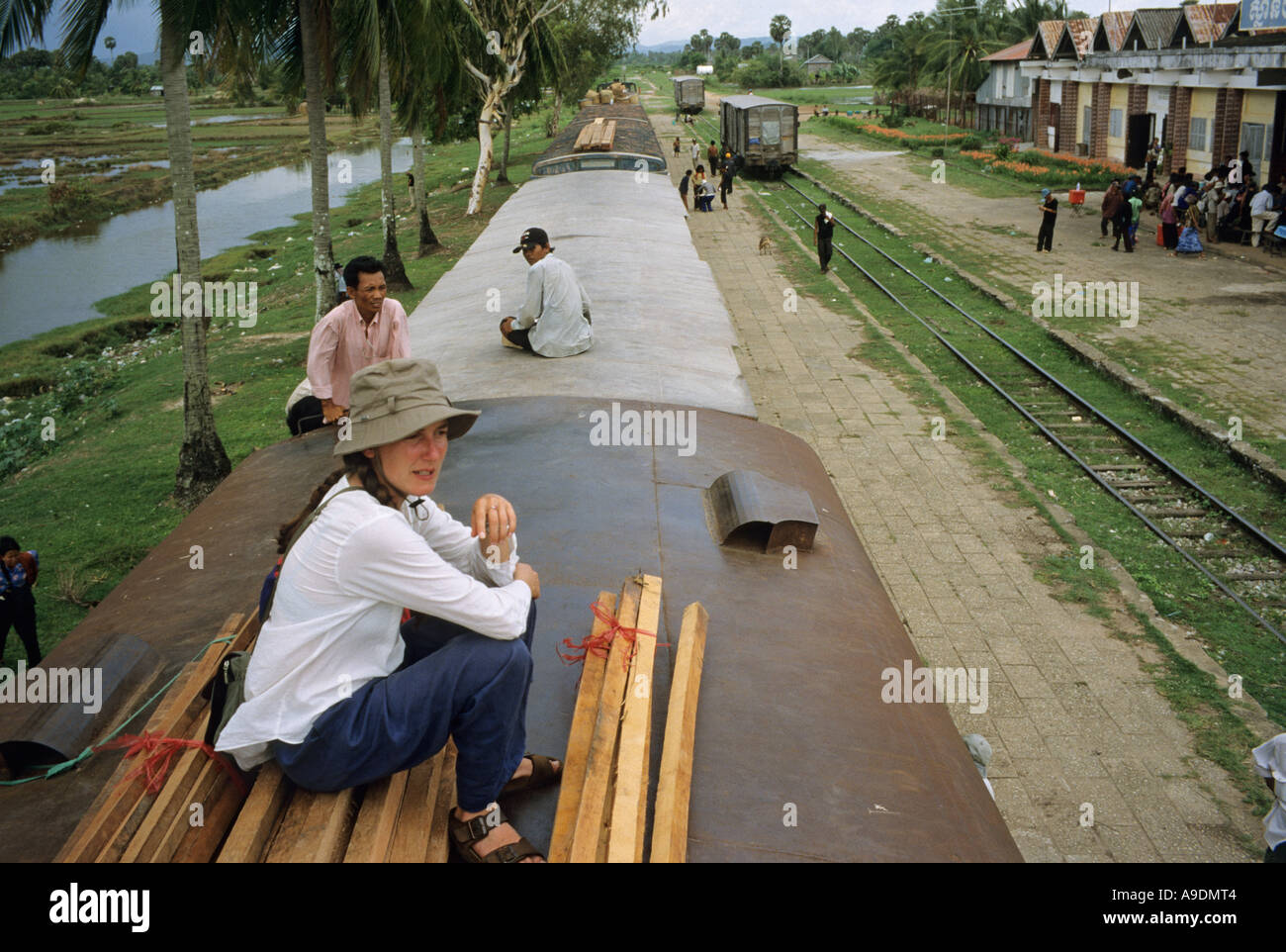 Tourist sitting on top of train at station in Kampot Cambodia Stock ...