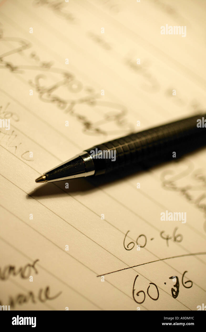 Pen and paper note pad Stock Photo - Alamy