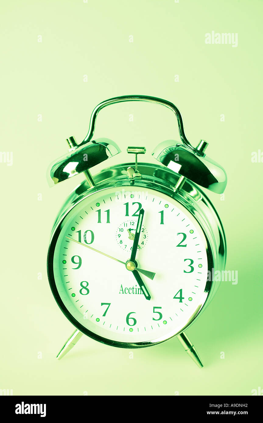Green alarm clock Stock Photo - Alamy