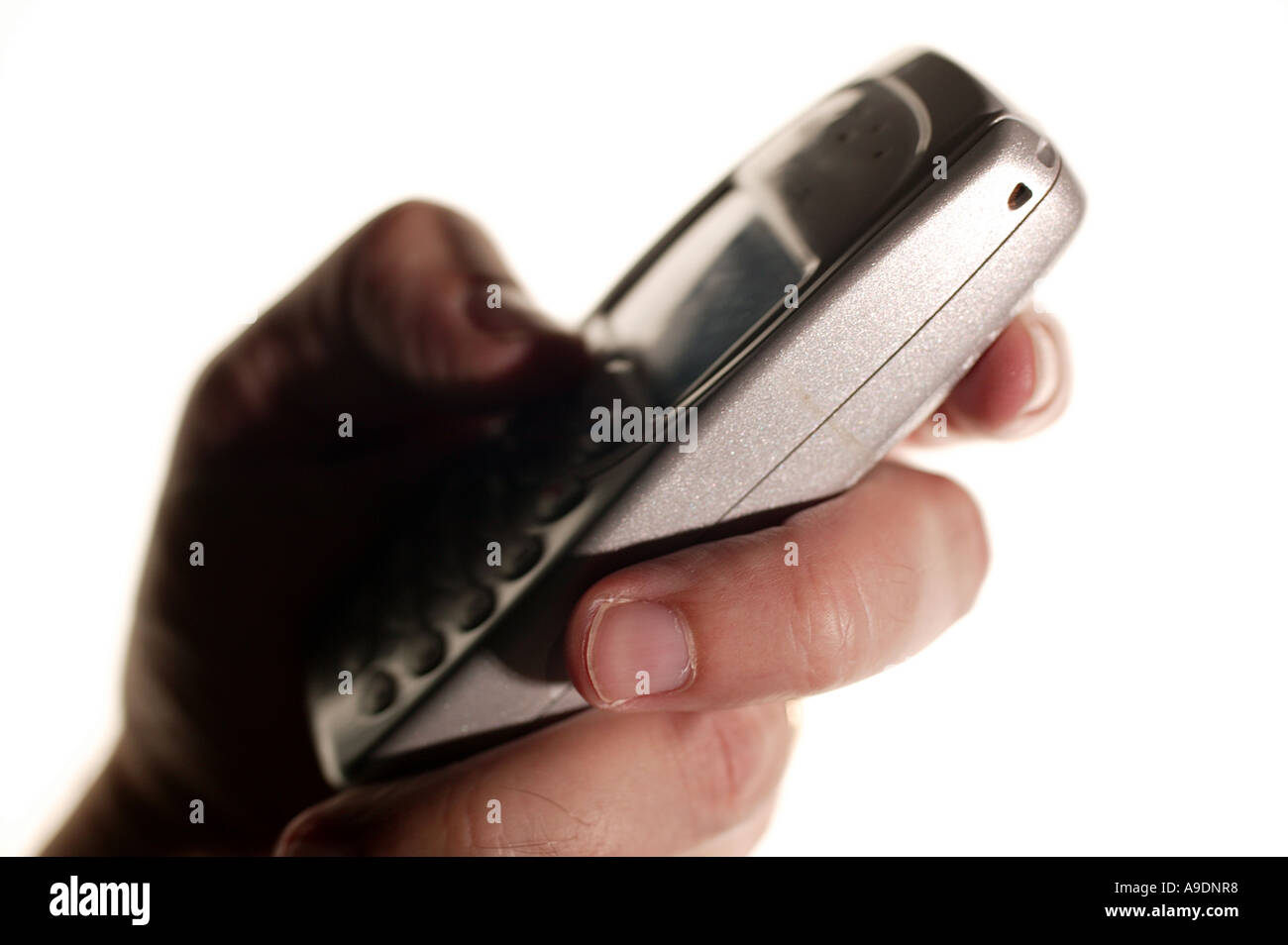 Holding mobile phone close up Stock Photo - Alamy