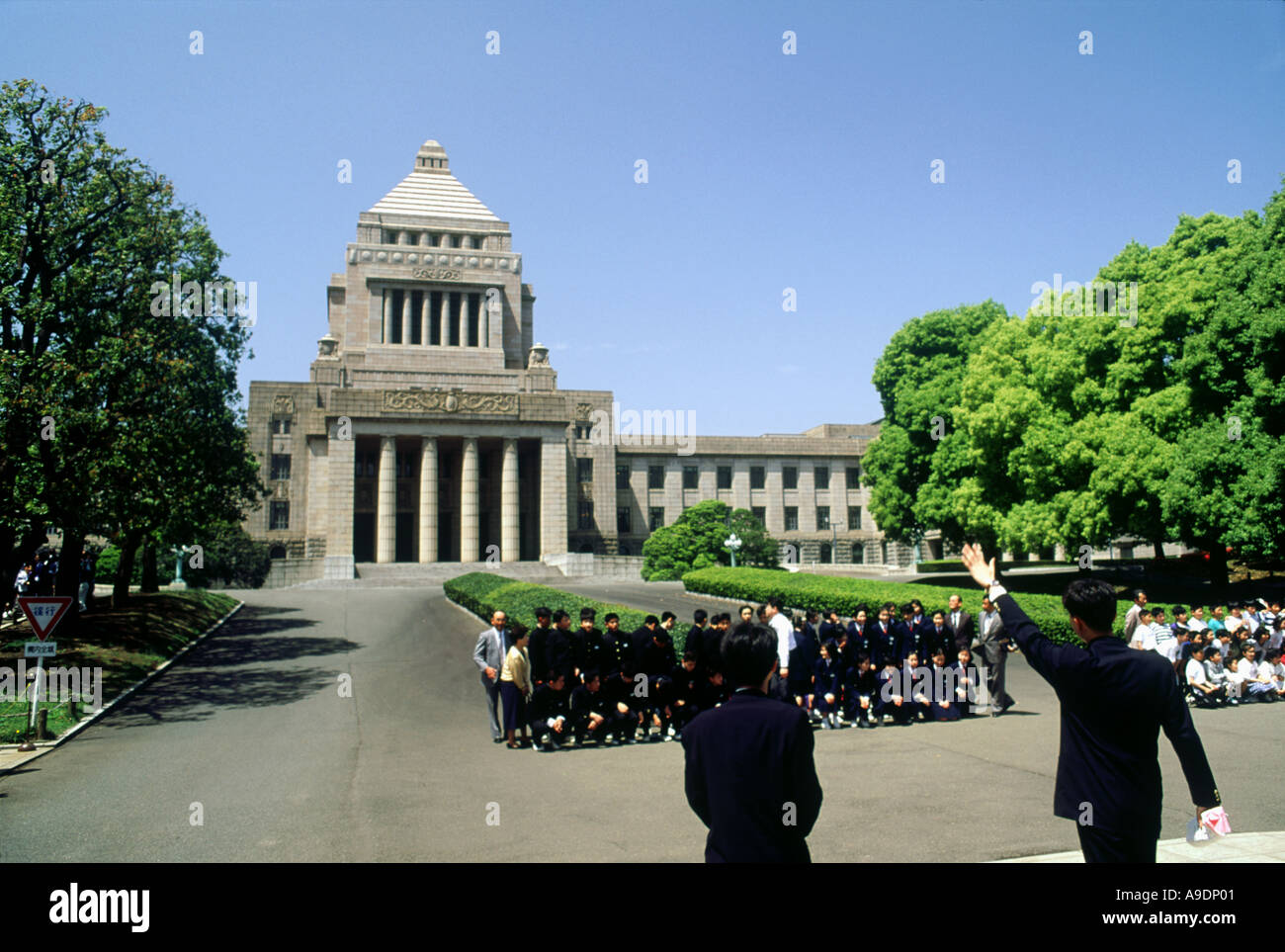 School tour group and Parliament Building Tokyo Japan Stock Photo - Alamy