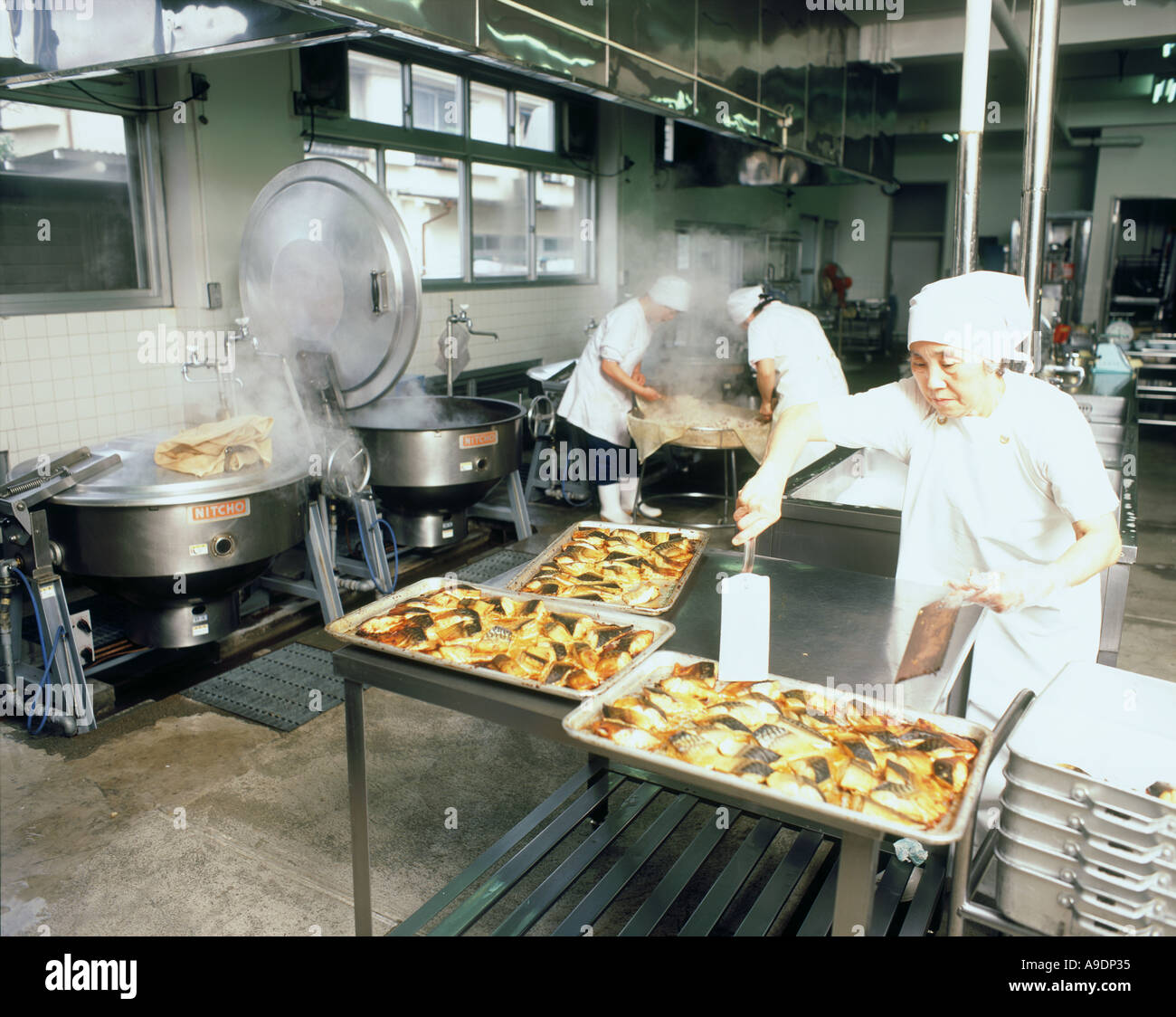 Cooking for lunch in school kitchen Tokyo Japan Stock Photo - Alamy