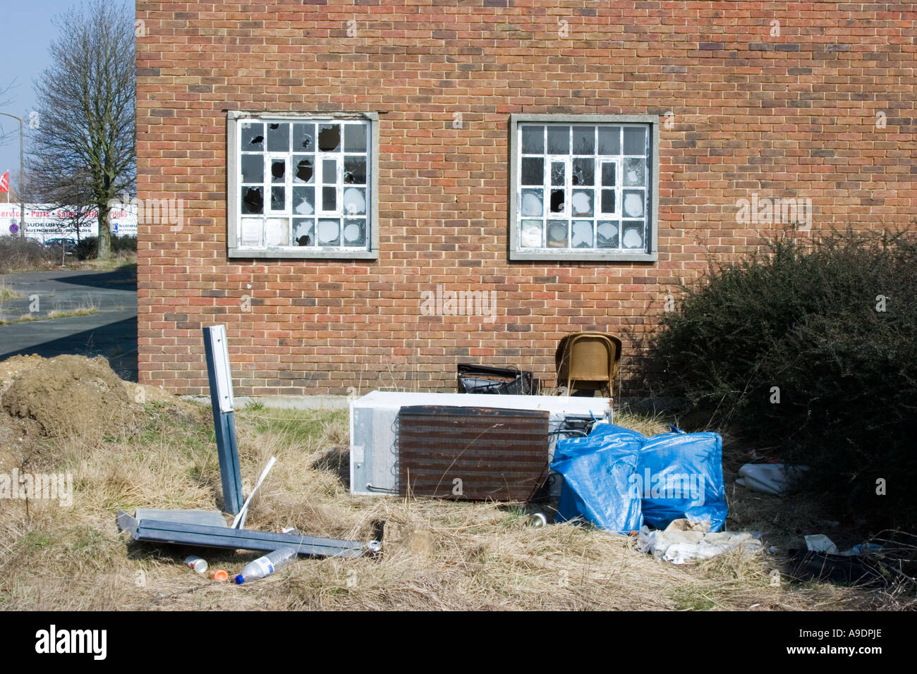 Broken windows in an empty and derelict office block, building on a ...