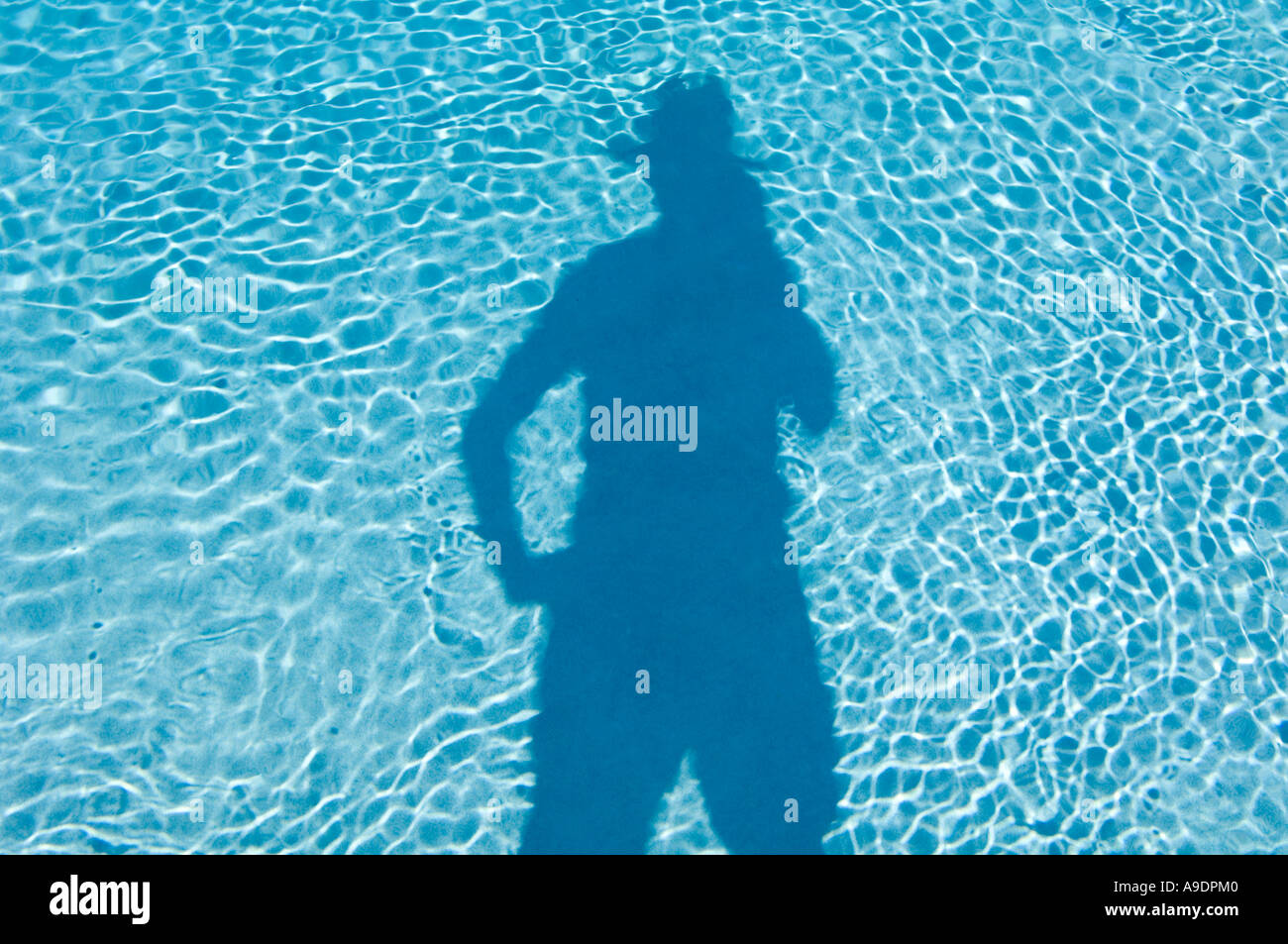 shadow of man on swimming pool Stock Photo - Alamy