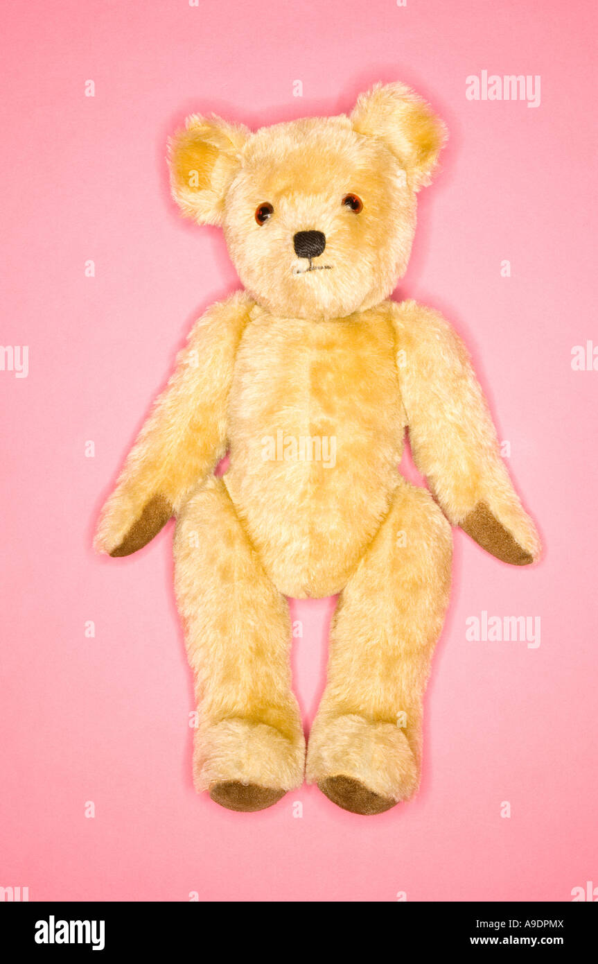 Traditional Teddy Bear flat lay on pink background Stock Photo - Alamy