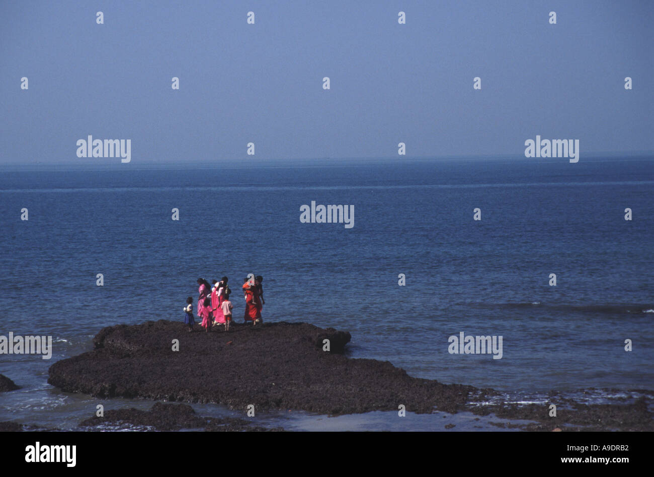 GOA On the rocks at Anjuna beach Stock Photo - Alamy