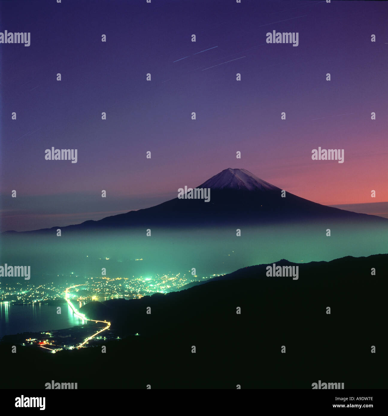 Mt Fuji and city lights Japan Stock Photo - Alamy