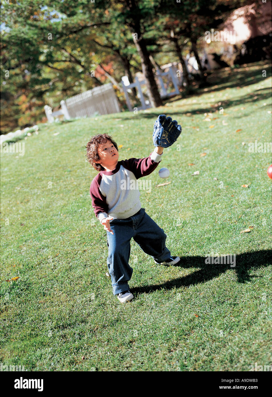 Boy in park Stock Photo - Alamy