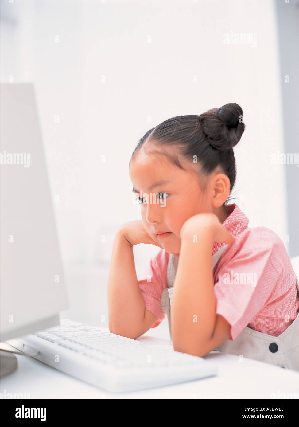 Child with computer Stock Photo - Alamy