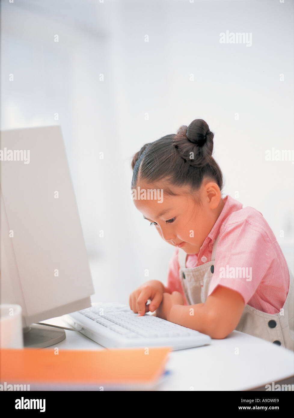 Child with computer Stock Photo - Alamy