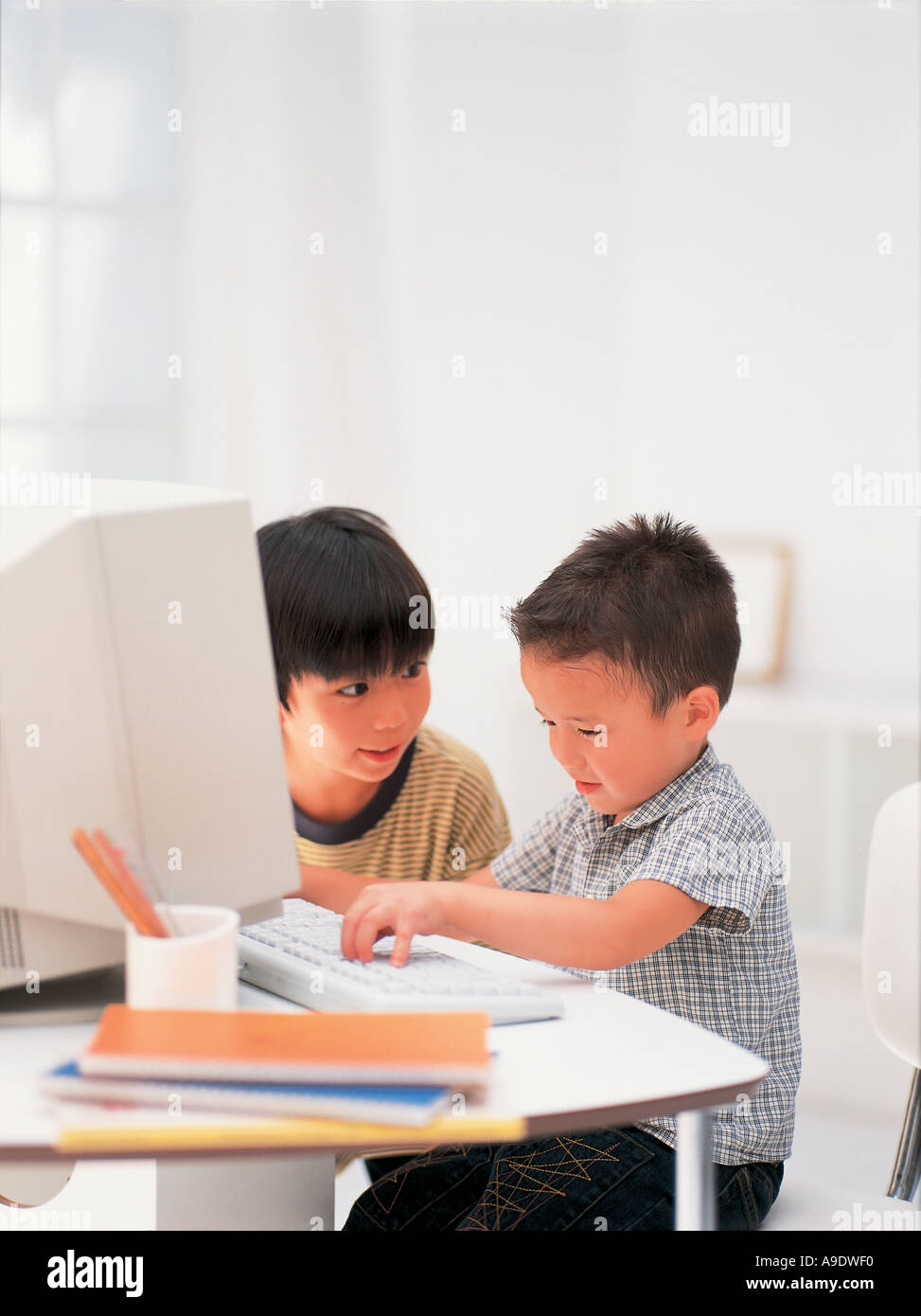 Children with computer Stock Photo - Alamy