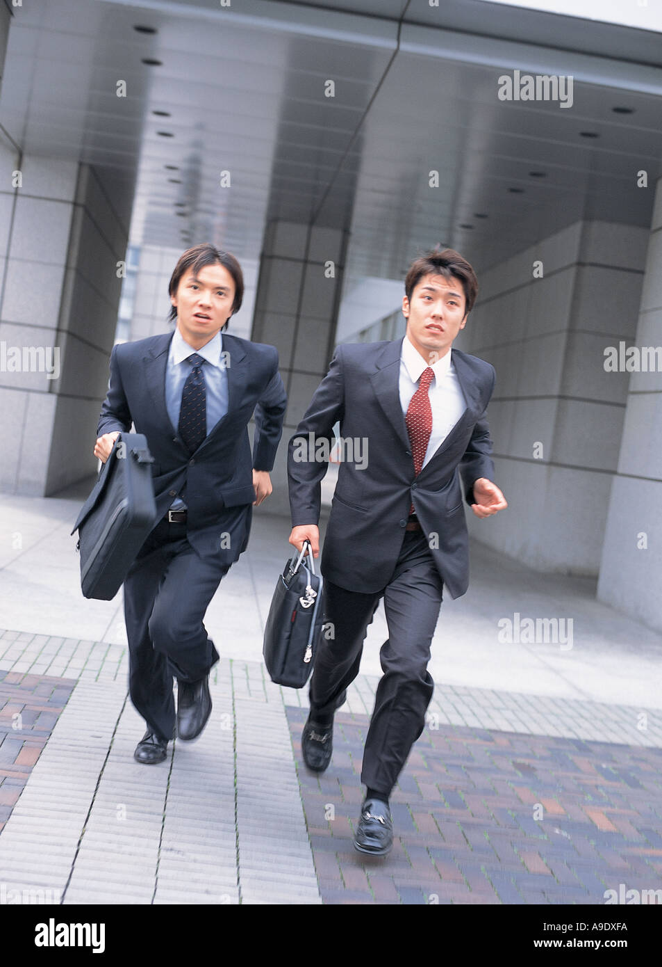 Men suits business running hi-res stock photography and images - Alamy