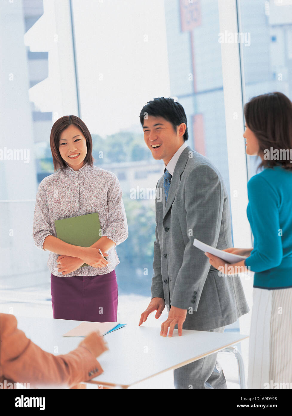 Business people talking Stock Photo - Alamy