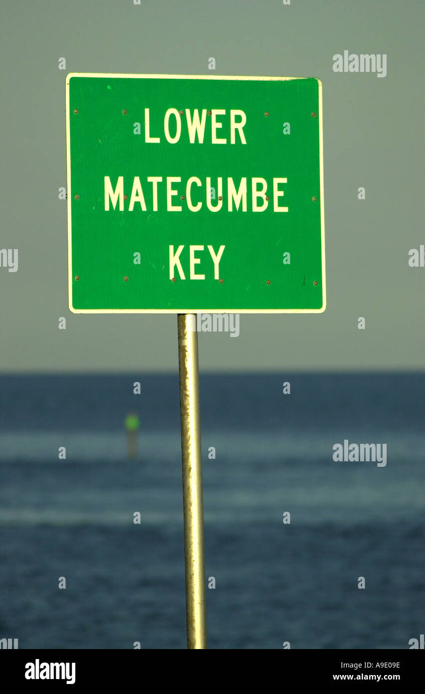 Vertial color image of sign along highway in the Florida Keys showing ...