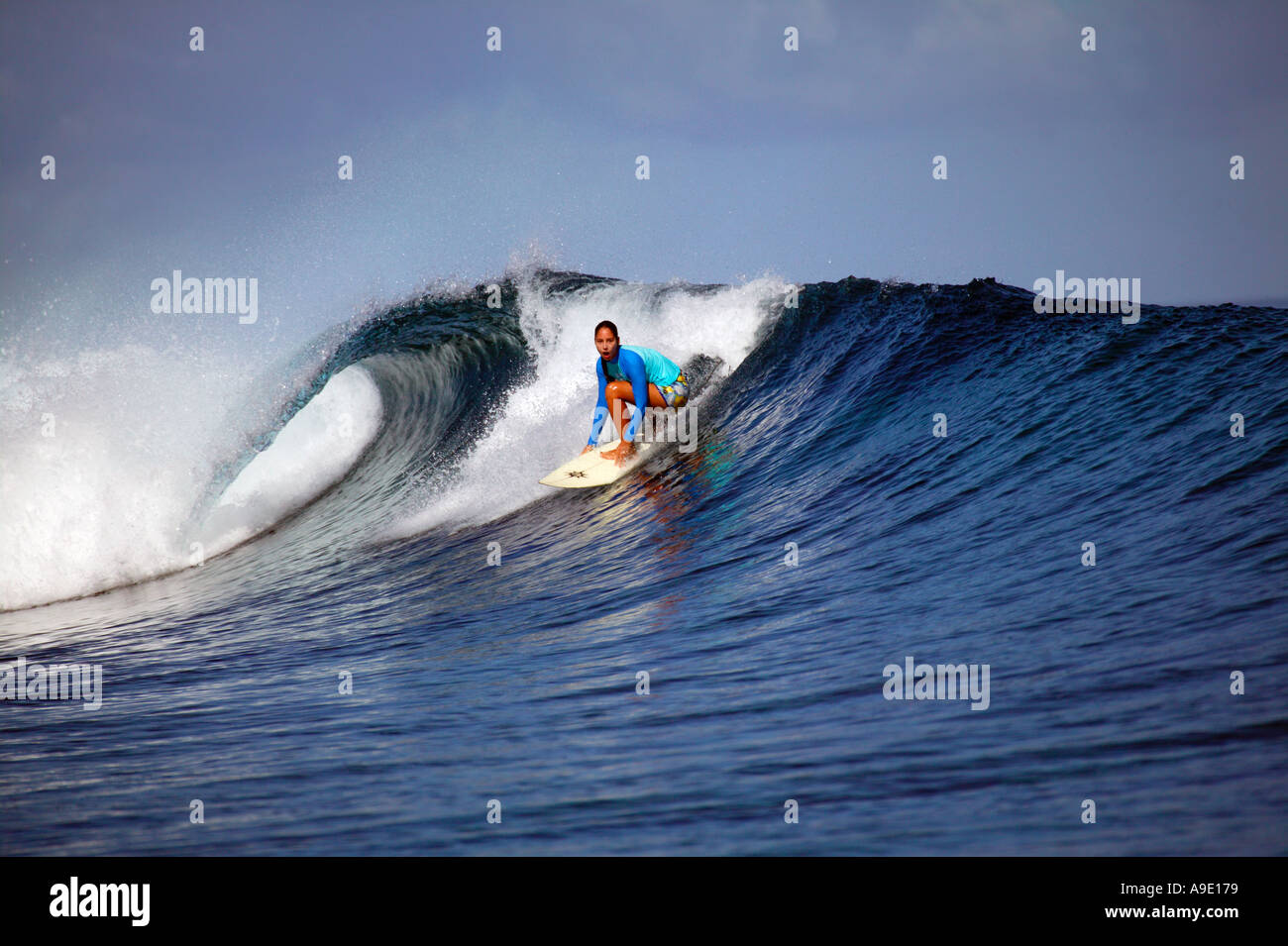 Carli Lovell surfing at cloudbreak Tavarua Fiji Model release 395 Stock ...
