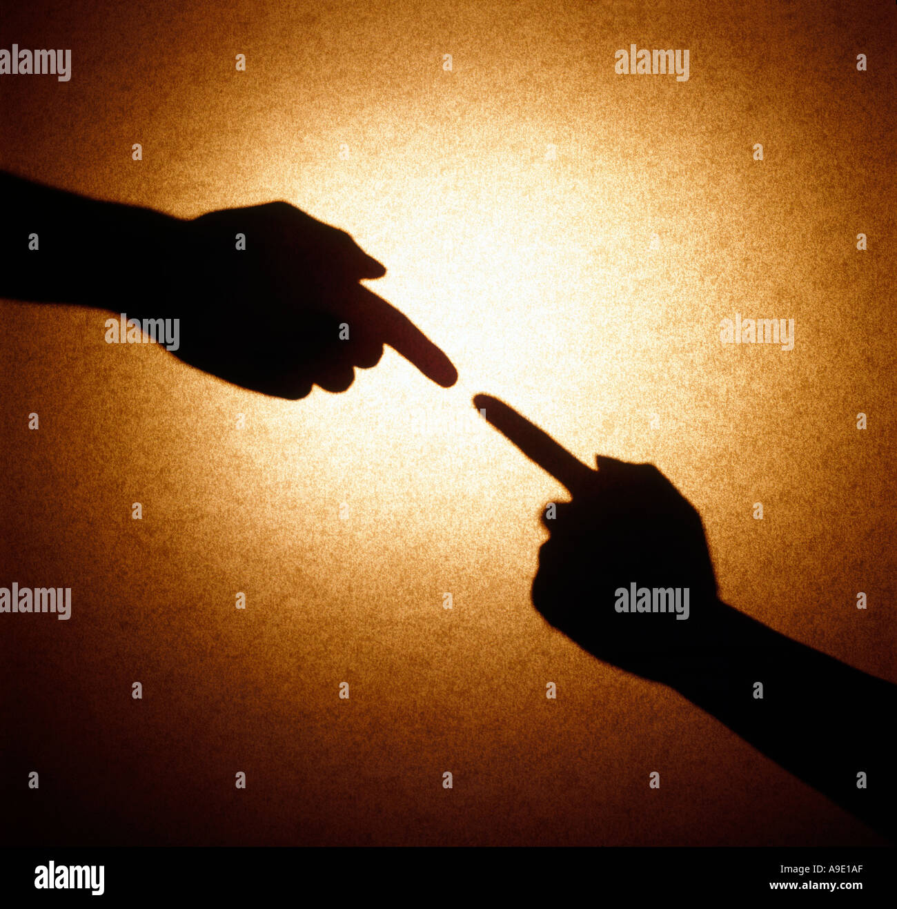 Two hands touching silhouette hi-res stock photography and images - Alamy