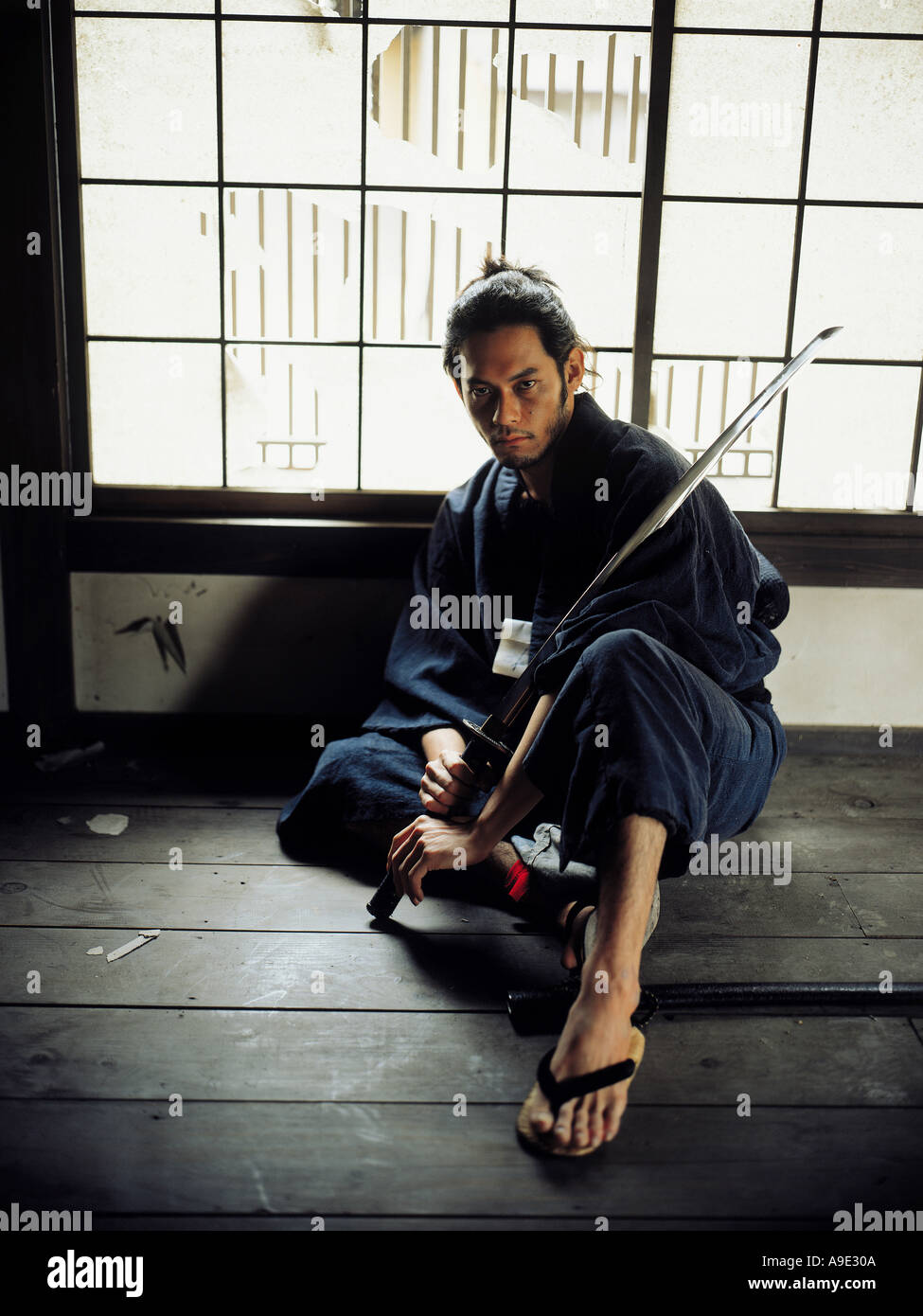 Samurai with raised sword hi-res stock photography and images - Alamy