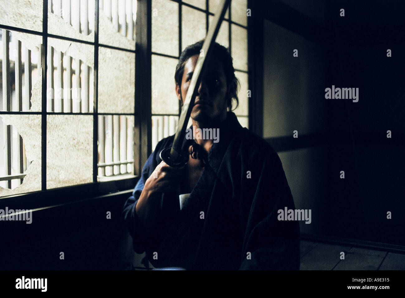 Samurai with raised sword hi-res stock photography and images - Alamy