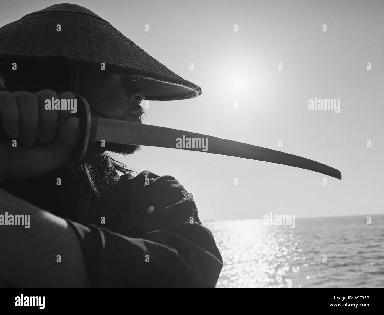 Samurai with raised sword hi-res stock photography and images - Alamy