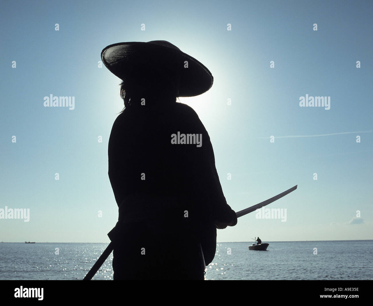 Samurai with raised sword hi-res stock photography and images - Alamy