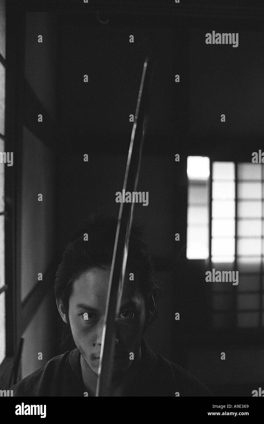 Raised sword Black and White Stock Photos & Images - Alamy