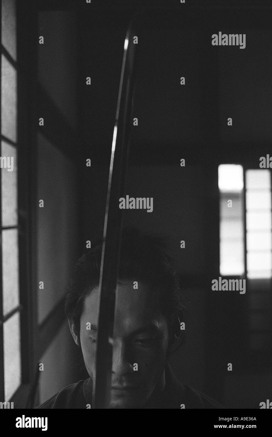 Raised sword Black and White Stock Photos & Images - Alamy