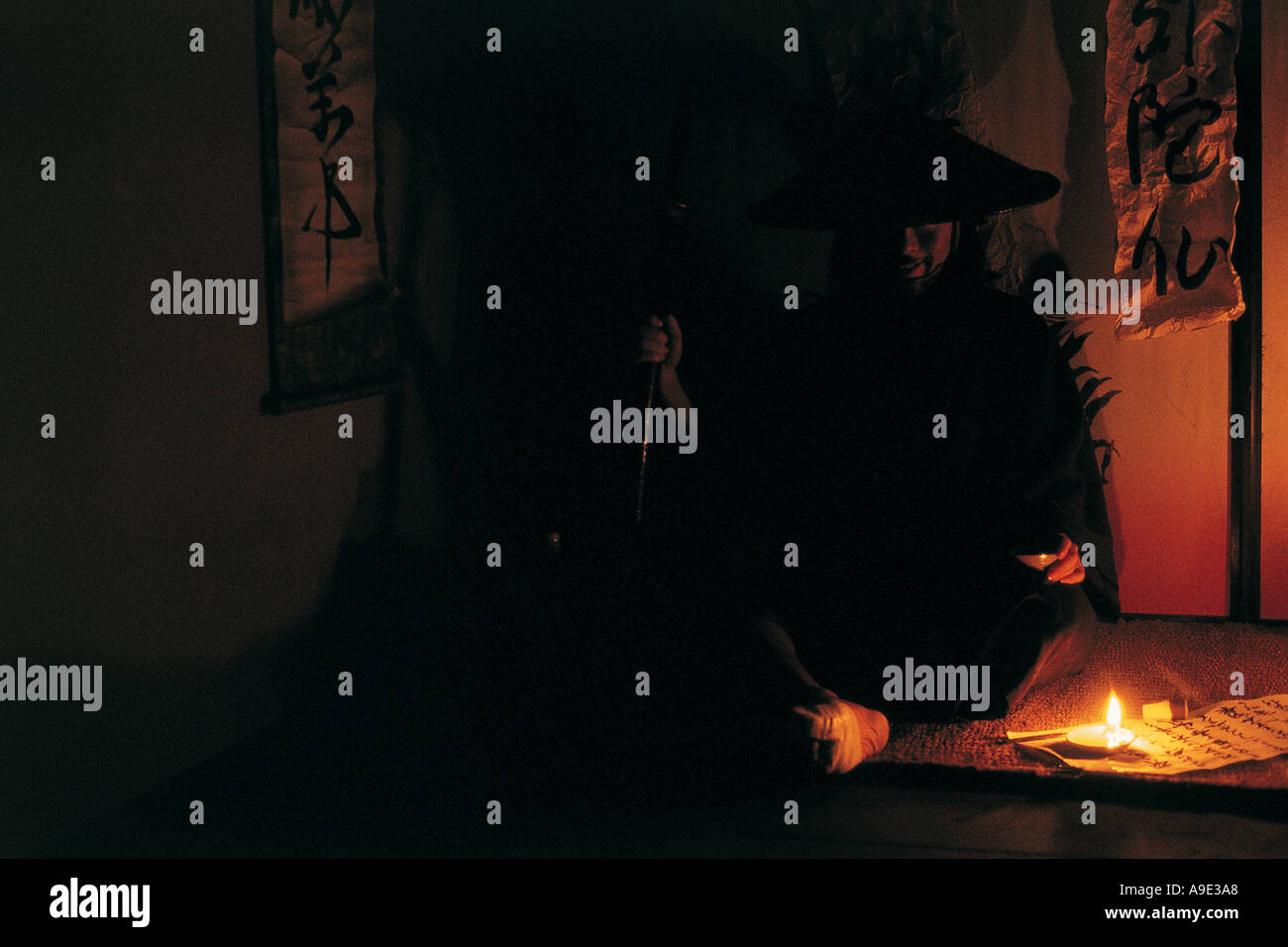 Samurai with raised sword hi-res stock photography and images - Alamy