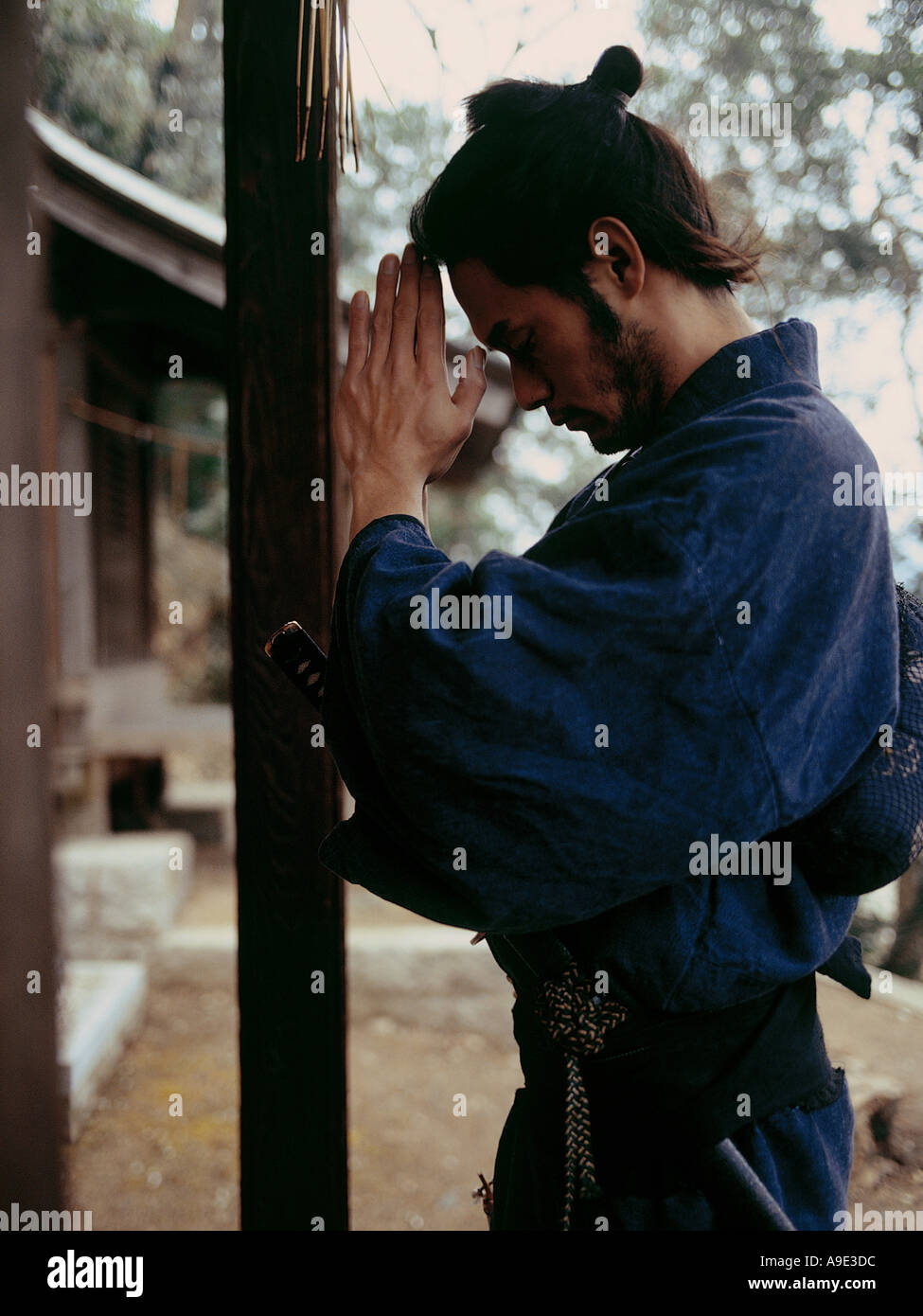 Old japanese person praying hi-res stock photography and images - Alamy
