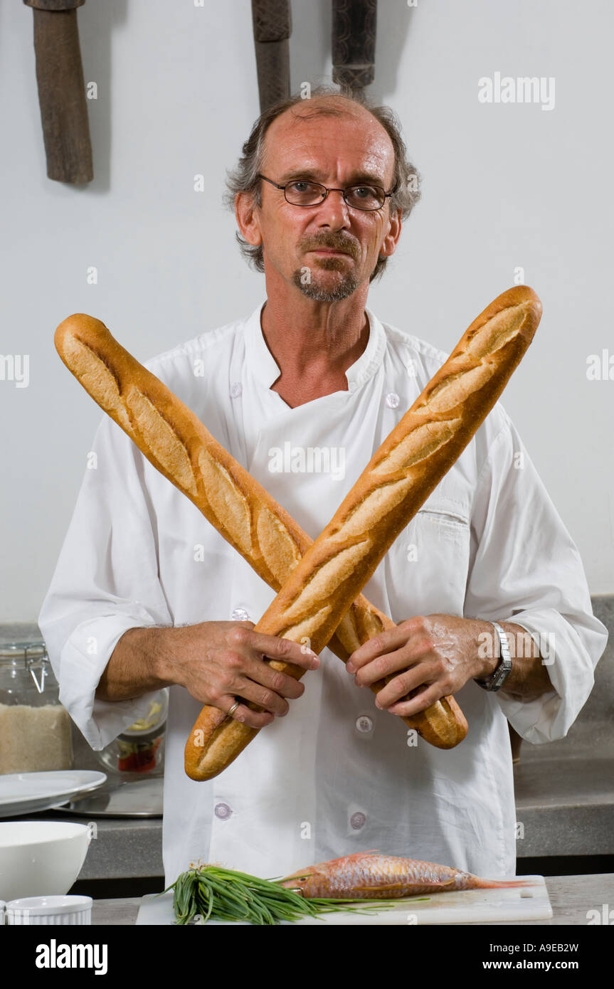 chef holding bread Stock Photo - Alamy