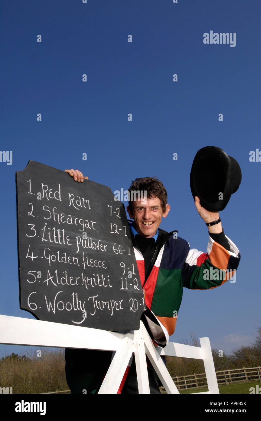 Bookie John Eason taking bets for the Grand National Sheep stakes held ...