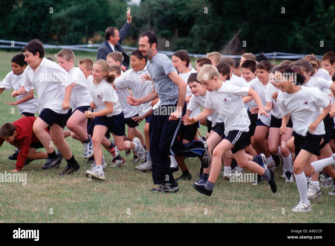 Year Six primary school students start a funrun with teacher nr London ...