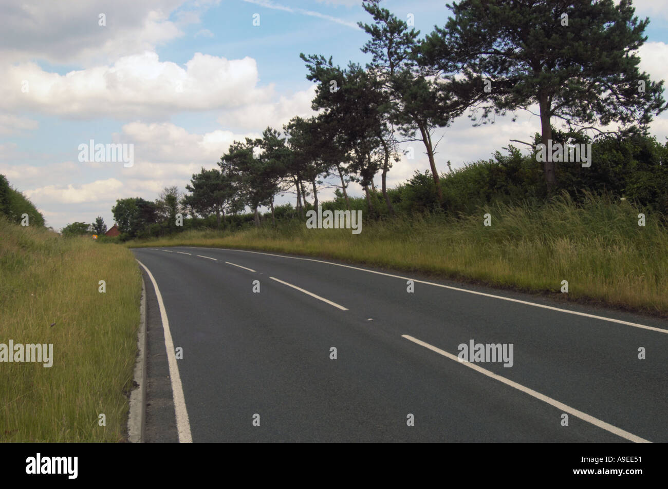 An empty country road in Surrey just outside the M25 London's orbital ...