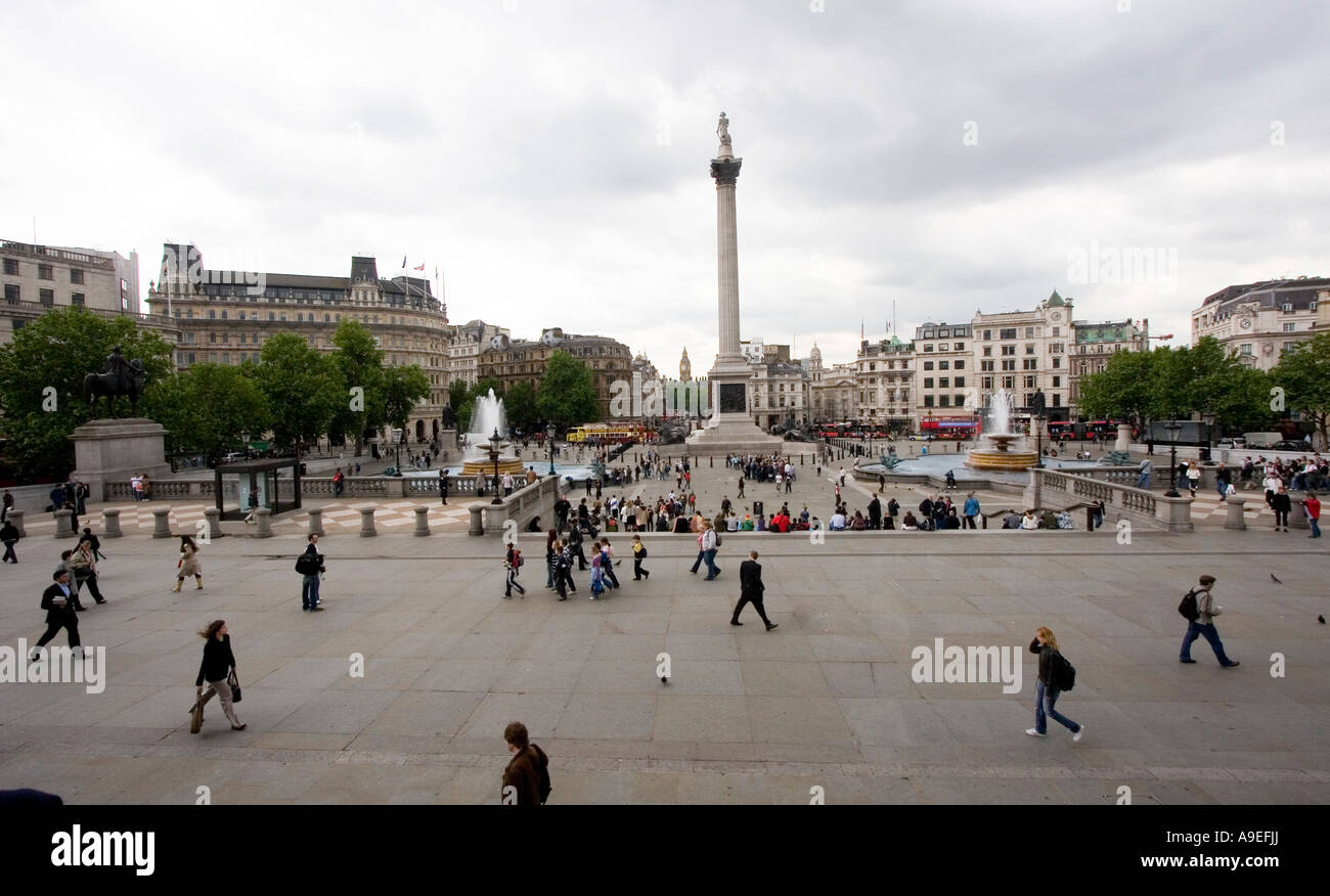 Trafalgar Square Nelsons Column tourists London GB UK Stock Photo - Alamy