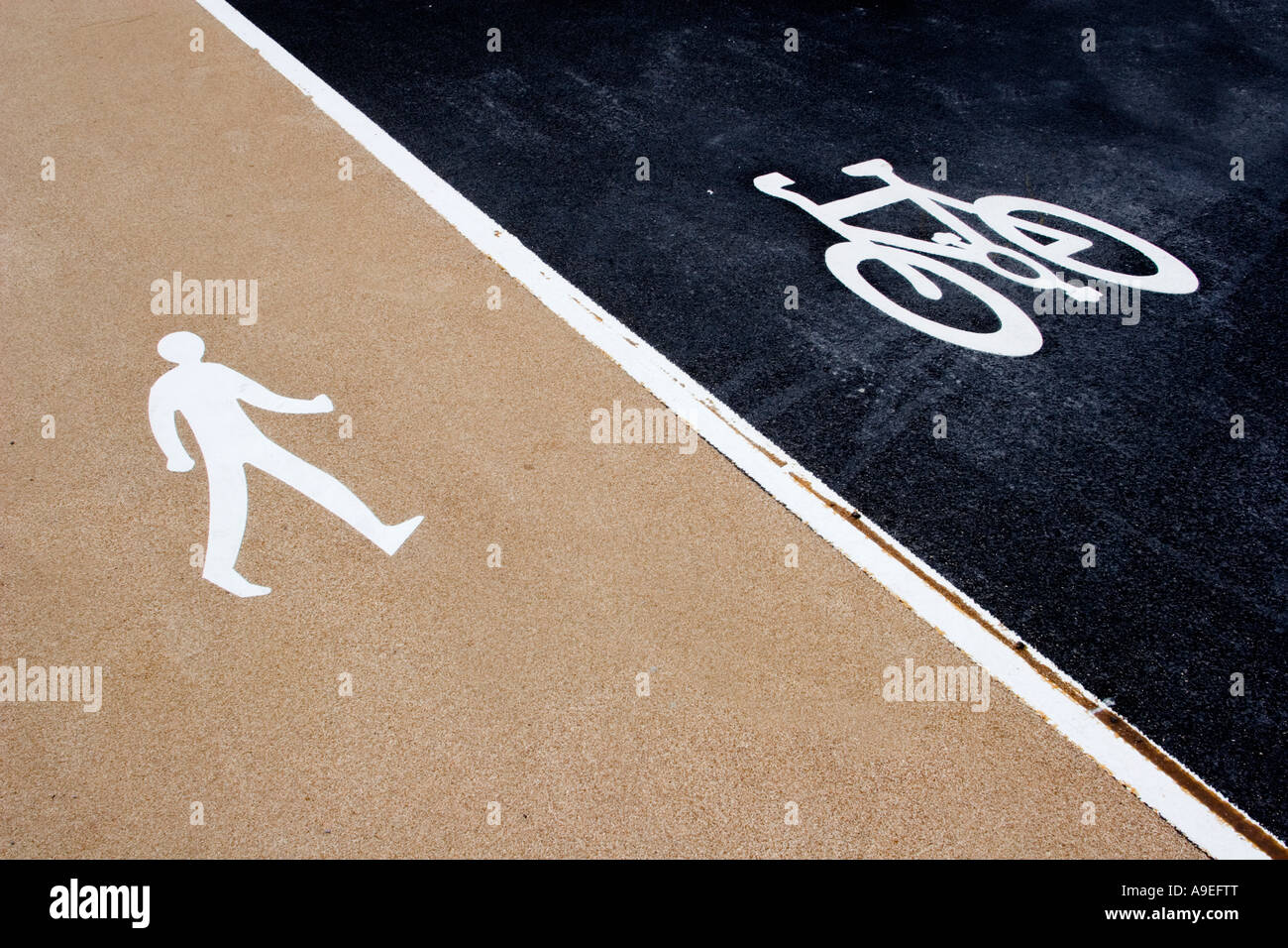 Painted road markings for parallel pedestrian and cycle routes Stock ...