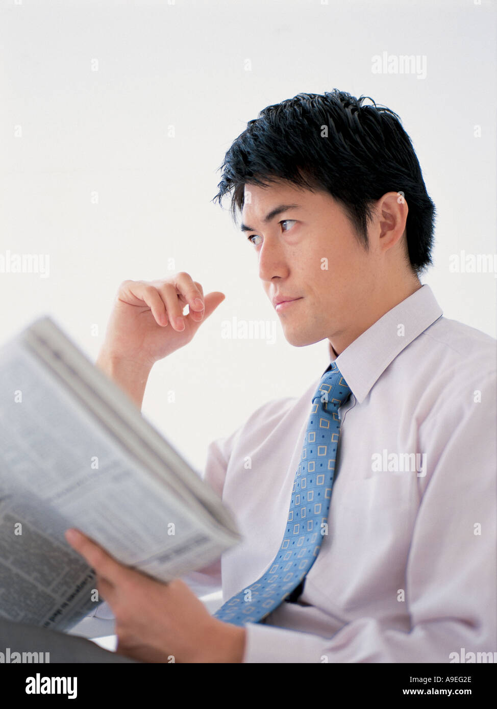 Japanese man reading newspaper hi-res stock photography and images - Alamy