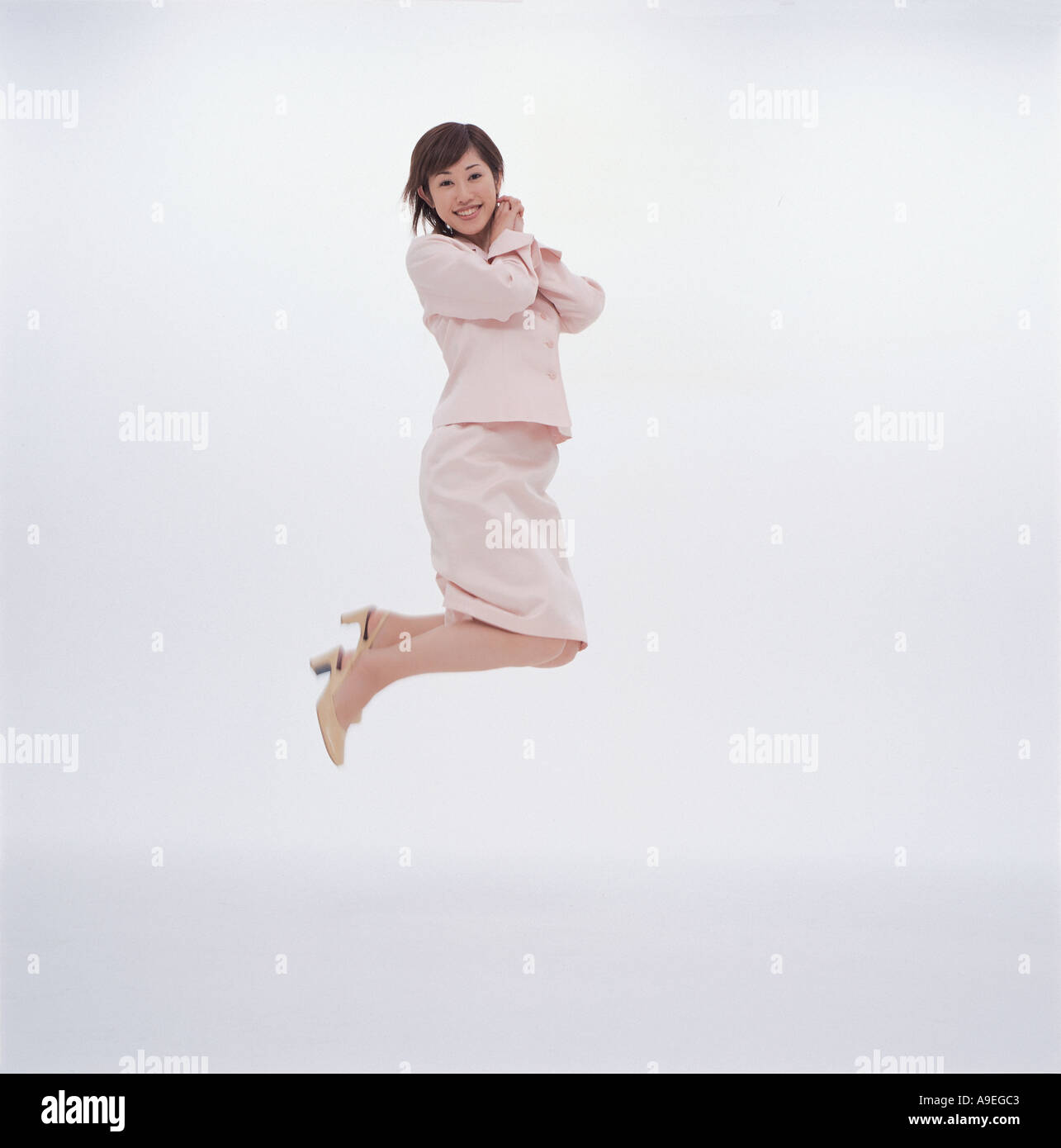 Japanese business woman jump hi-res stock photography and images - Alamy