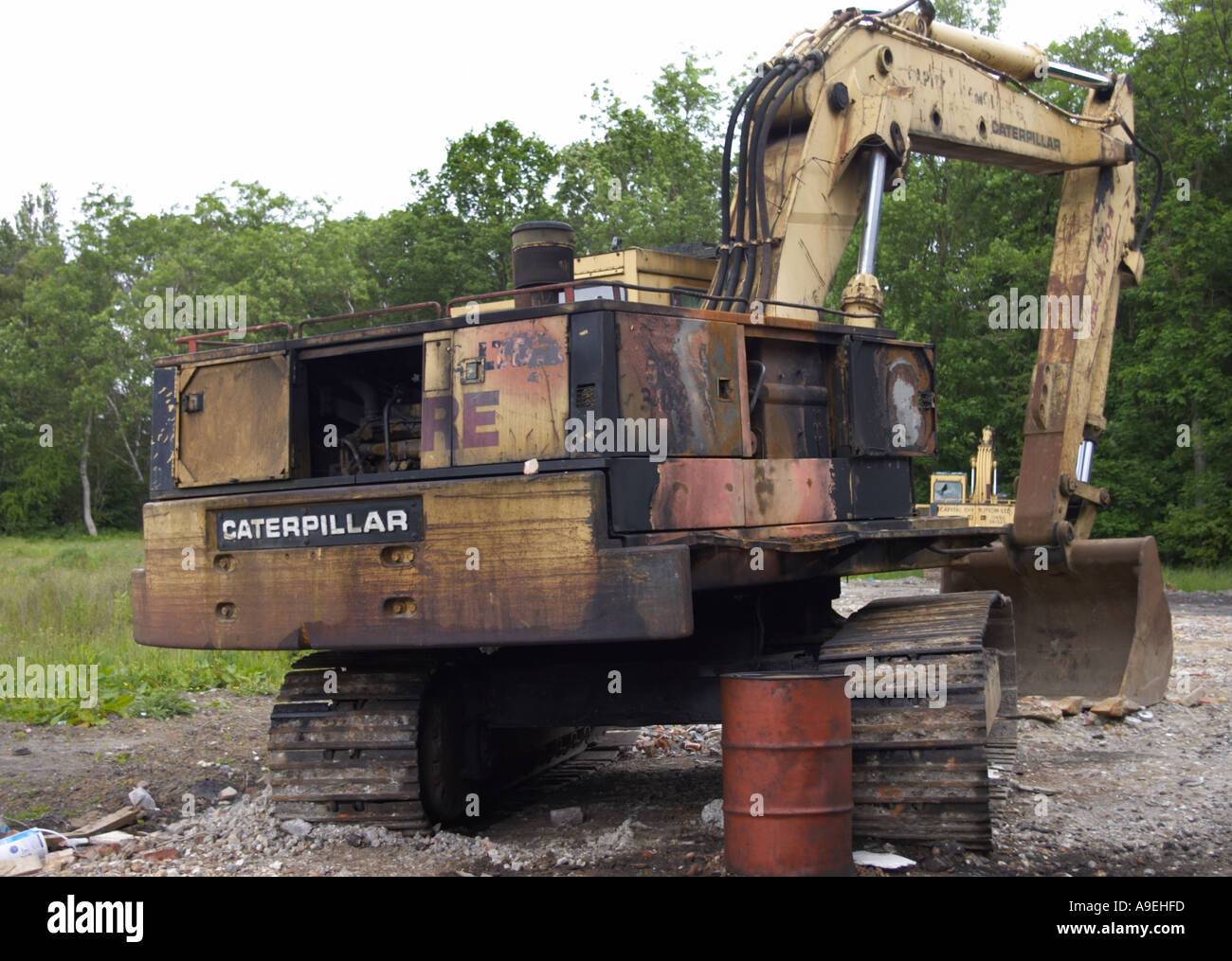 abandoned rusting road diggers in countryside Stock Photo - Alamy