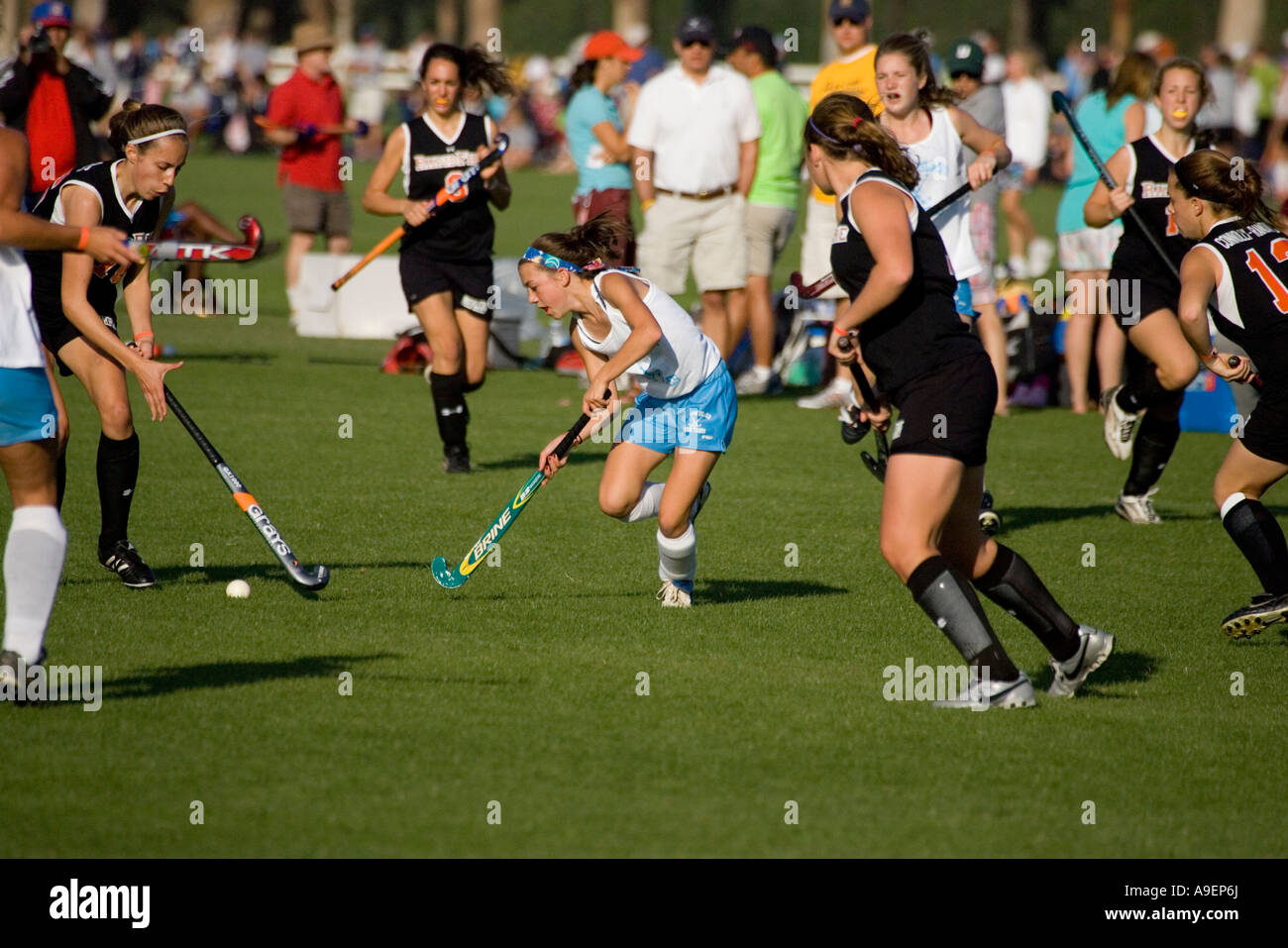 Girls Playing Field Hockey Stock Photo - Alamy