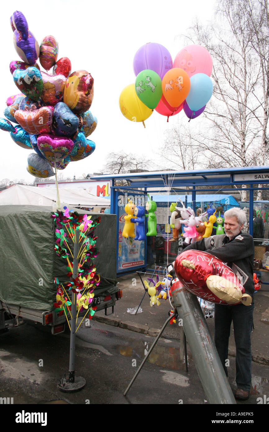 Child selling balloons hi-res stock photography and images - Alamy