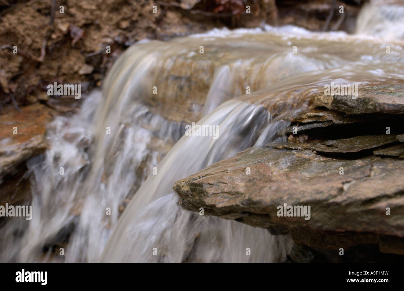 waterfall cascading over rocks Stock Photo - Alamy